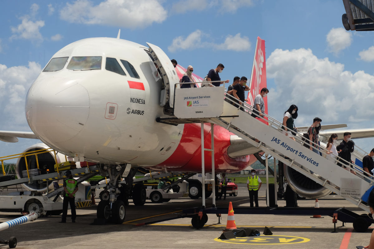 Bali Airport Commits To Reducing Wait Times For Tourists - The Bali Sun